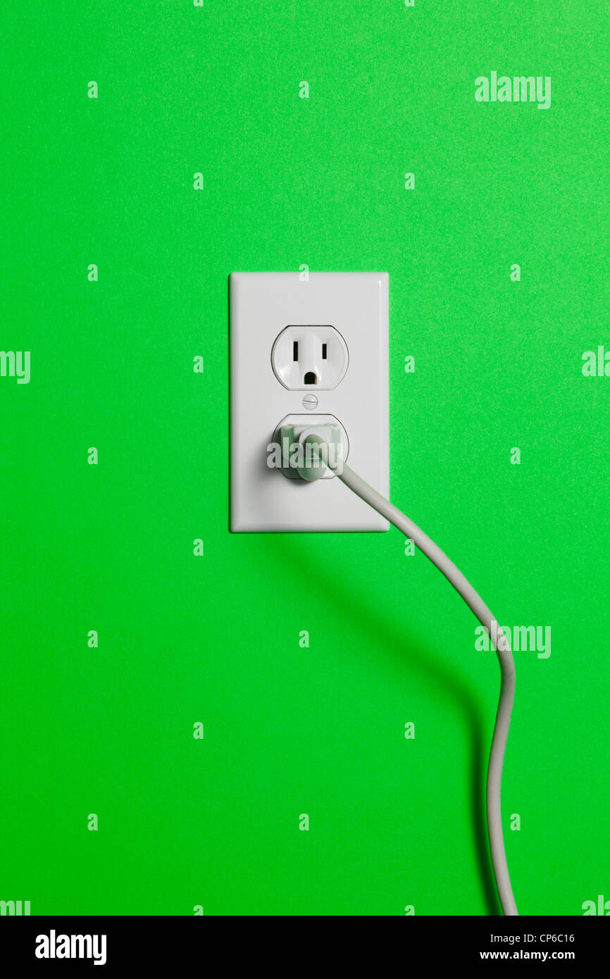 Green Wall outlet Stock Photo - Alamy