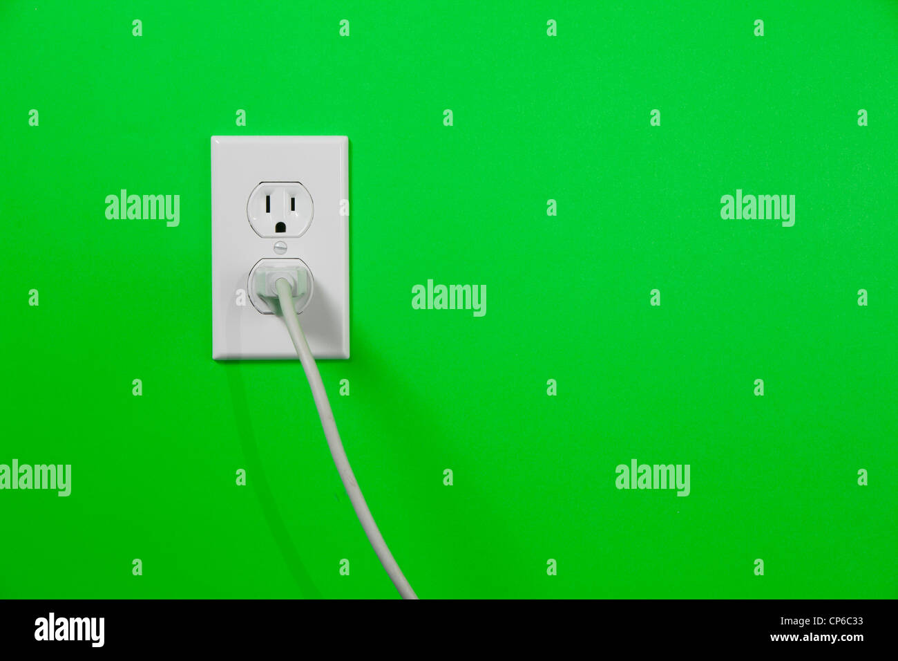 Green Wall outlet Stock Photo - Alamy