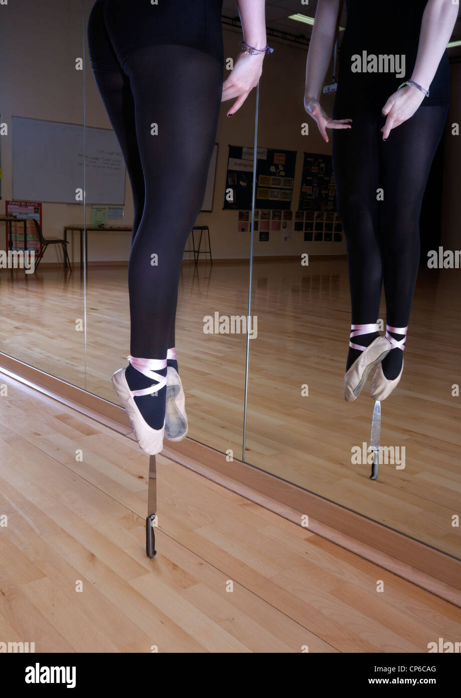 A ballerina performing the dance move 'En Pointe' Stock Photo - Alamy