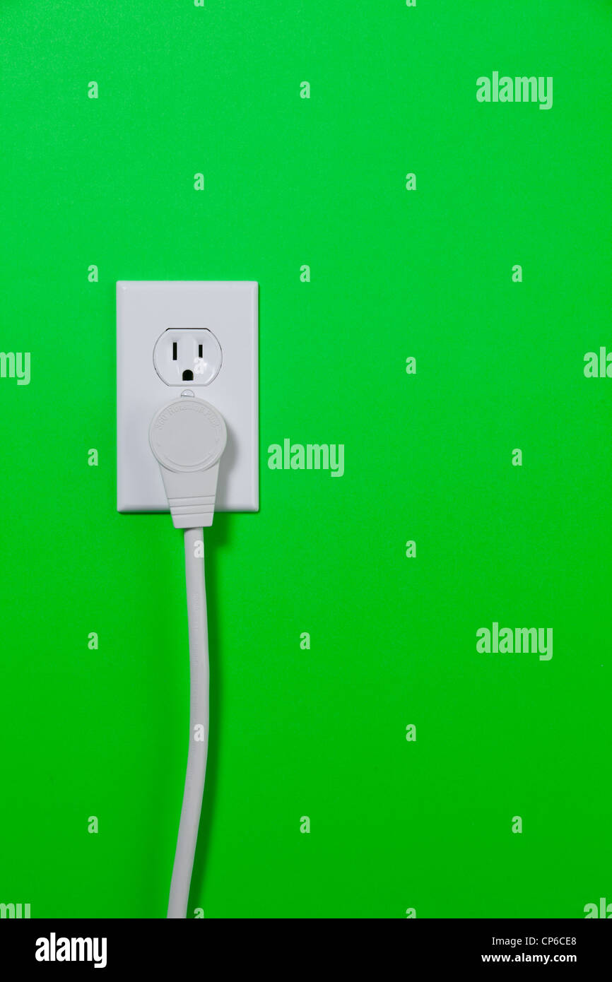 Green Wall outlet Stock Photo - Alamy