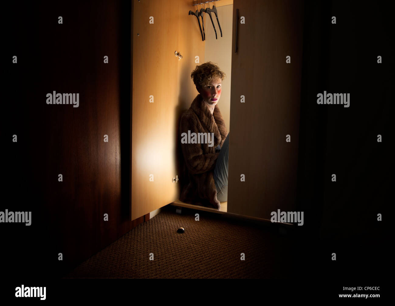 A person hiding their literal skeleton in a closet Stock Photo - Alamy
