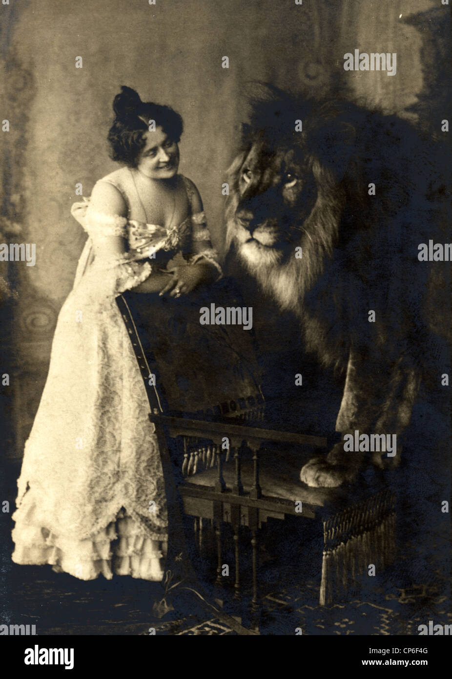 The Confident Lady & The Lion Stock Photo - Alamy