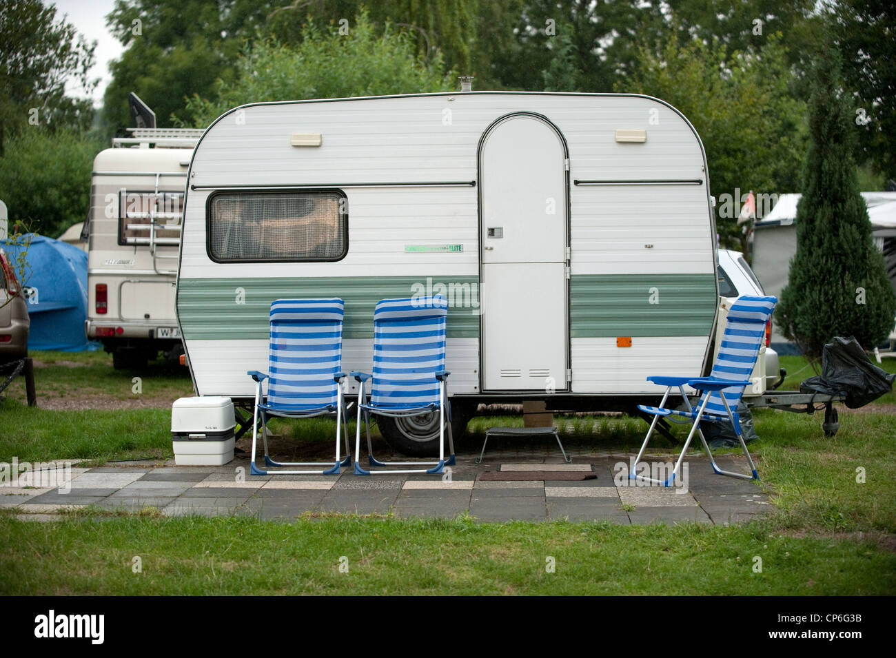 Small old European caravan and chairs Cologne Germany Europe EU Stock ...