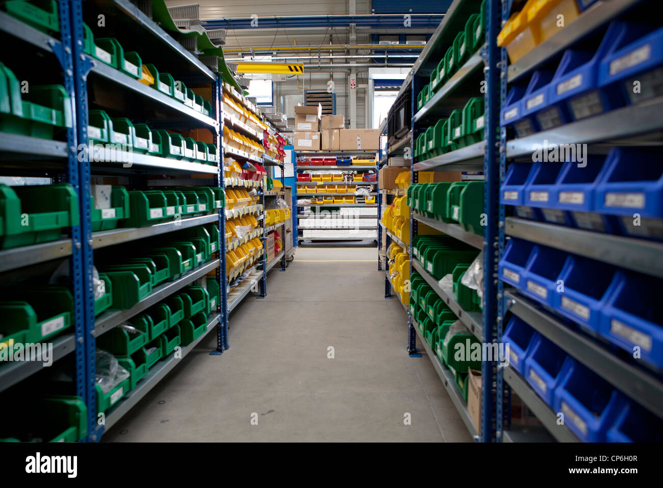factory stockroom boxes on shel Stock Photo - Alamy