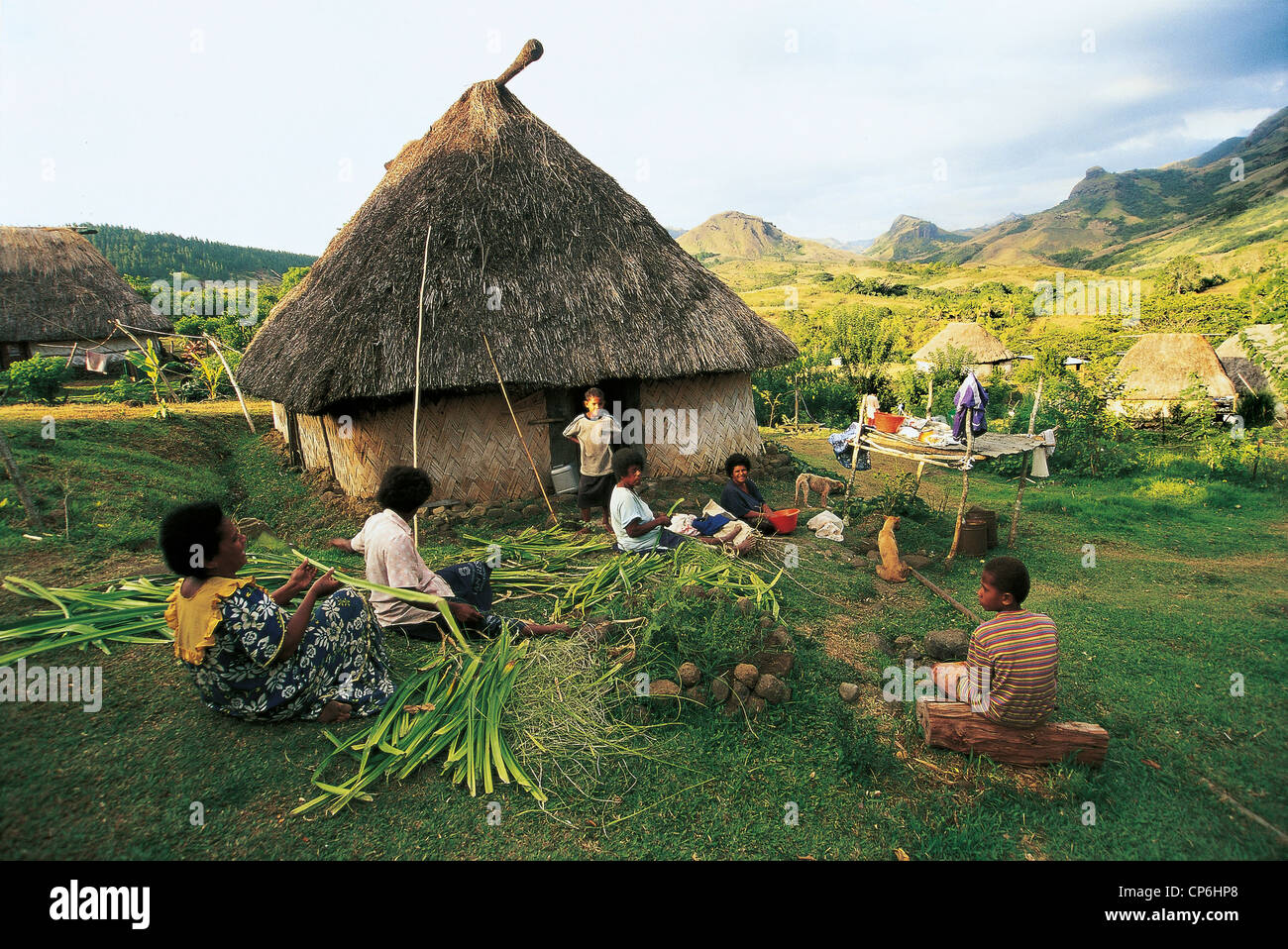 Fiji - Viti Levu Island, a village of Naval. Women work of palm leaves ...