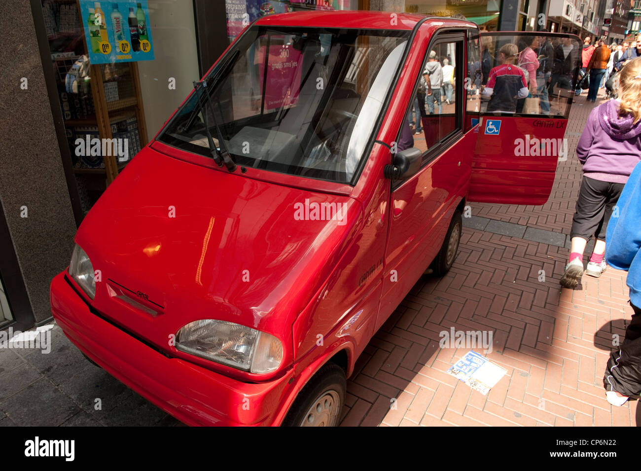 Tiny Mini Small Wheelchair Disabled car Amsterdam Stock Photo - Alamy