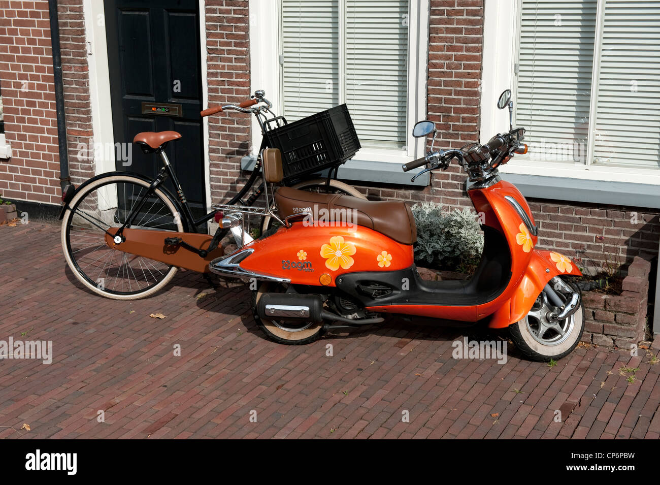 Bicycle and moped parked Delft Netherlands Holland Europe EU Stock ...