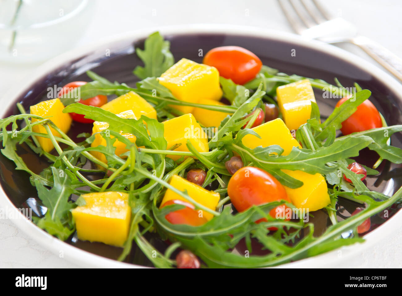 Mango and Rocket salad Stock Photo - Alamy
