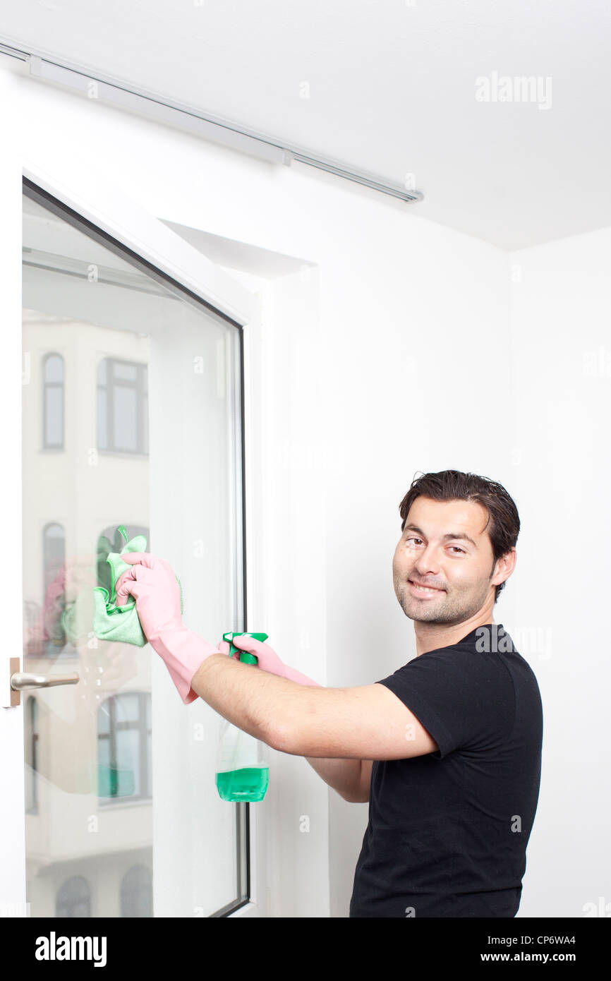 Man cleaning a window Stock Photo - Alamy