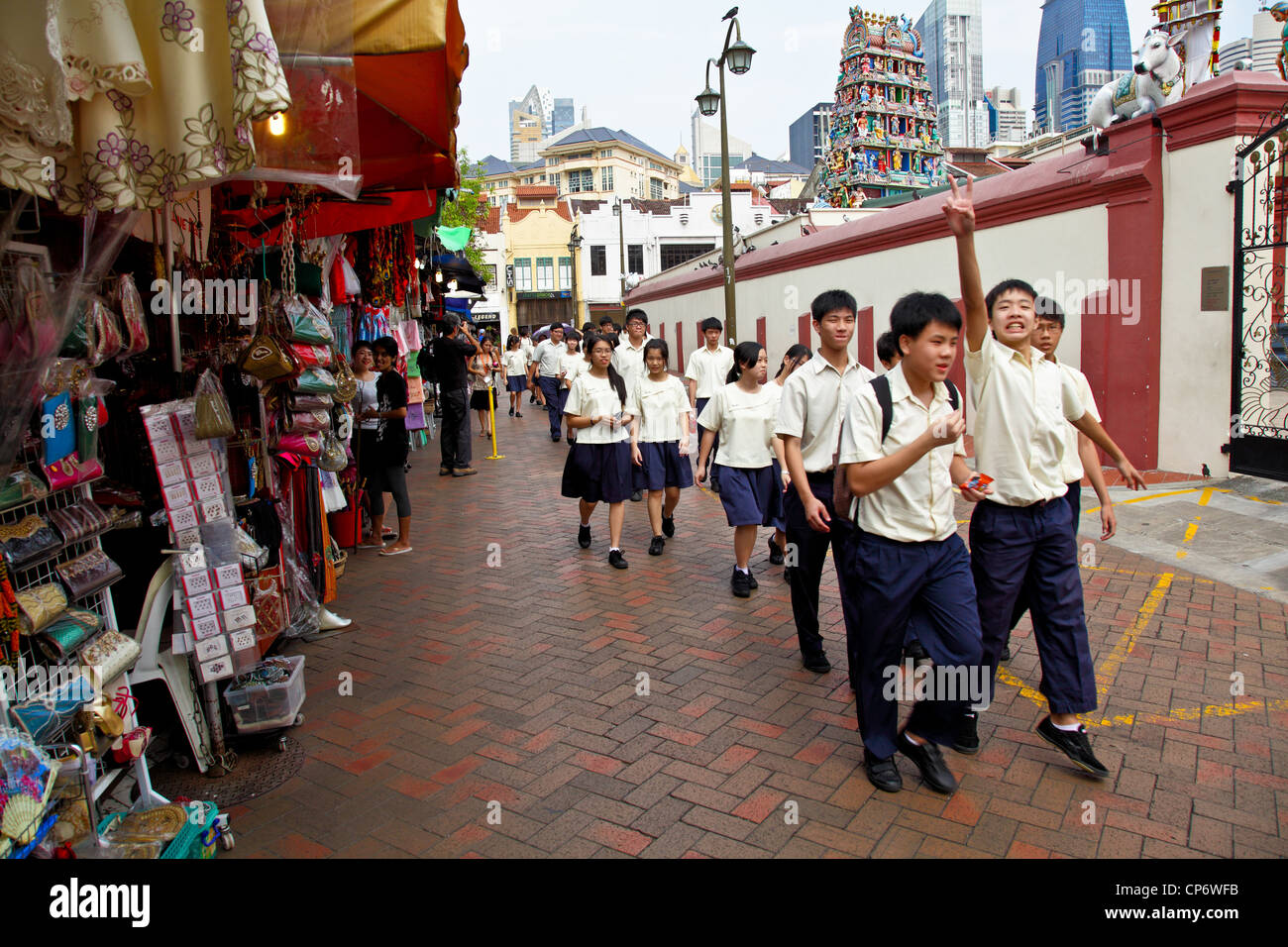 happy students in singapore street Stock Photo - Alamy