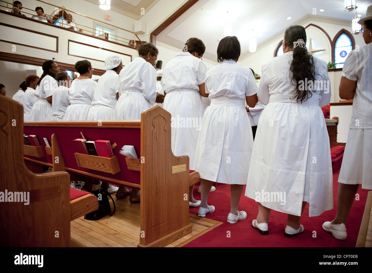 Singing and praying band congregated at camp meeting church Stock Photo ...