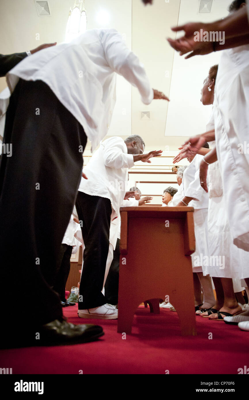 Singing and praying band congregated at camp meeting church Stock Photo ...