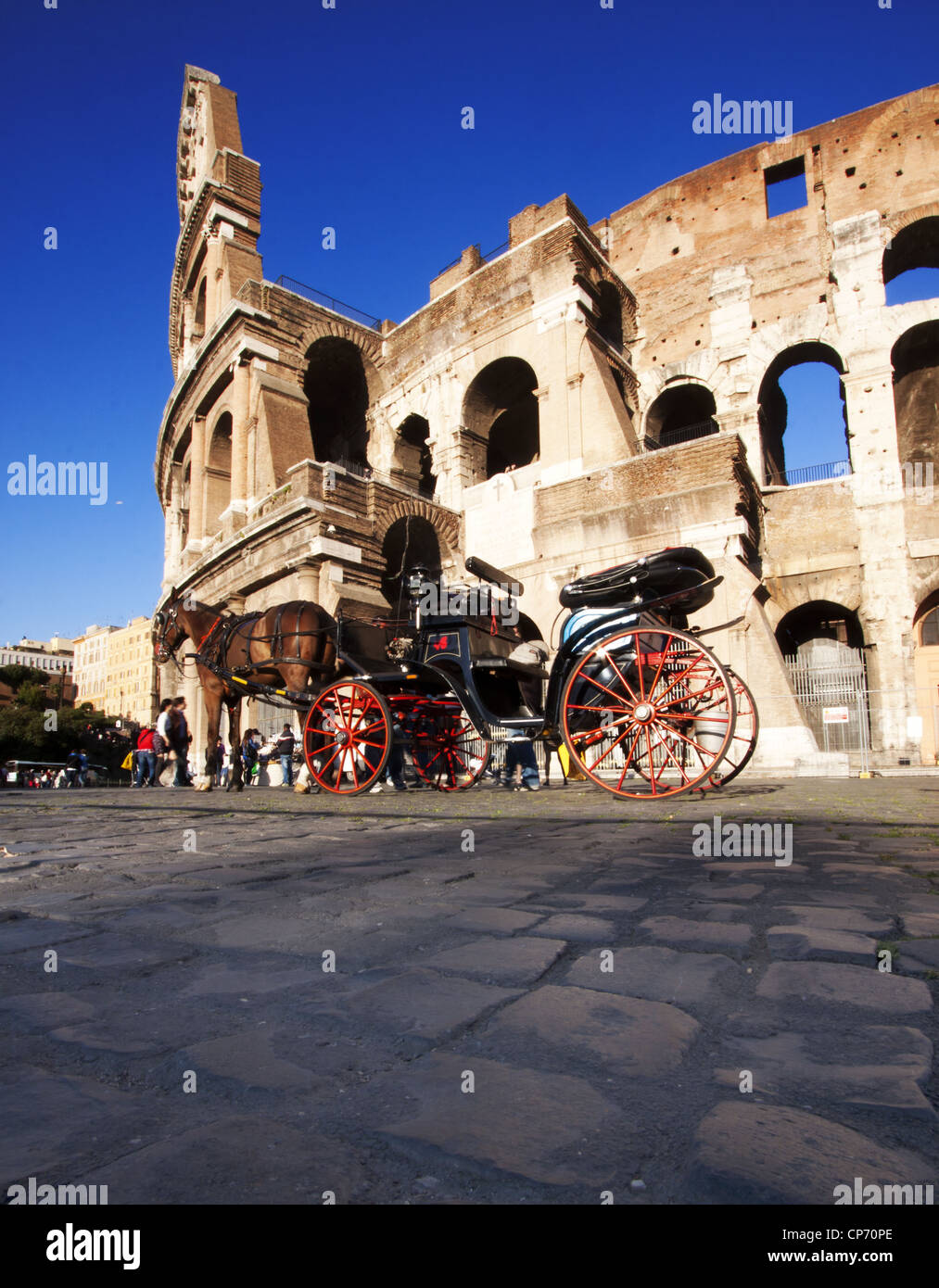 Roman traditional horse carriage and The Colosseum, Rome, Italy Stock ...