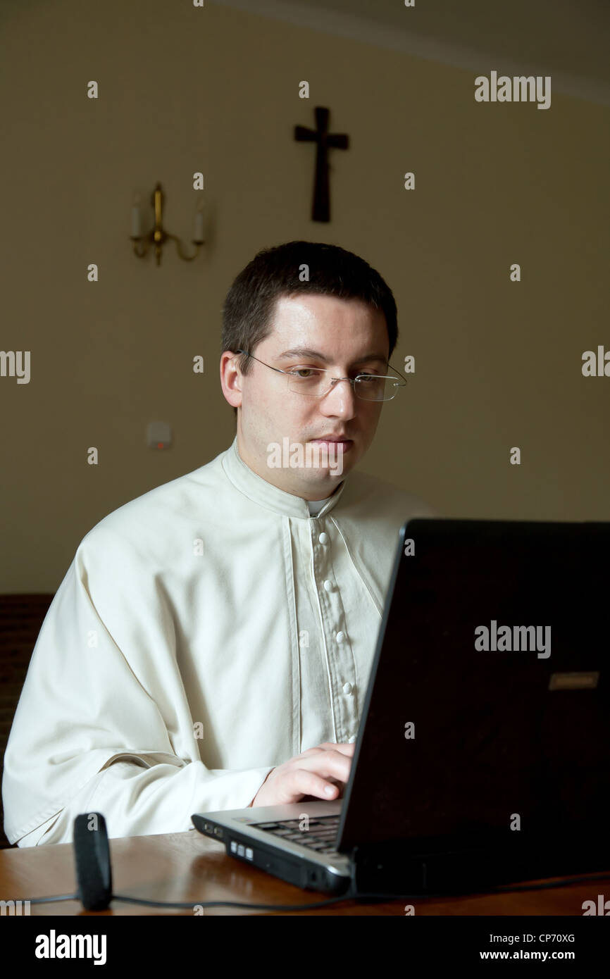 Priest working hi-res stock photography and images - Alamy