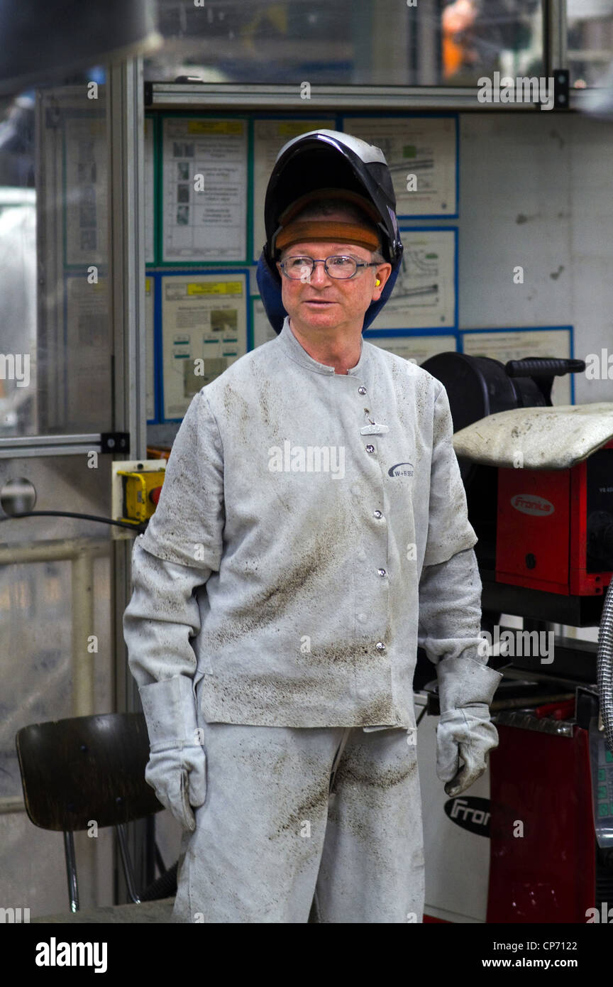 A welder at the Volkswagen AG factory in Wolfsburg, Germany Stock Photo ...