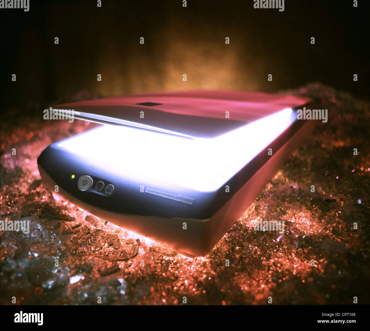 A flat bed scanner on glowing glass Stock Photo - Alamy