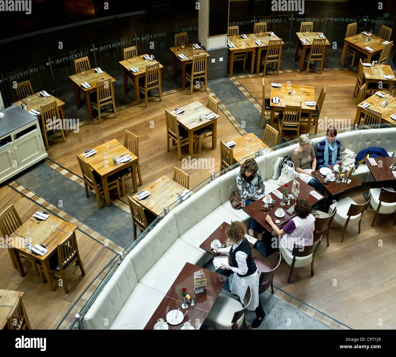 Customers sitting in a restaurant in a shopping centre Stock Photo - Alamy