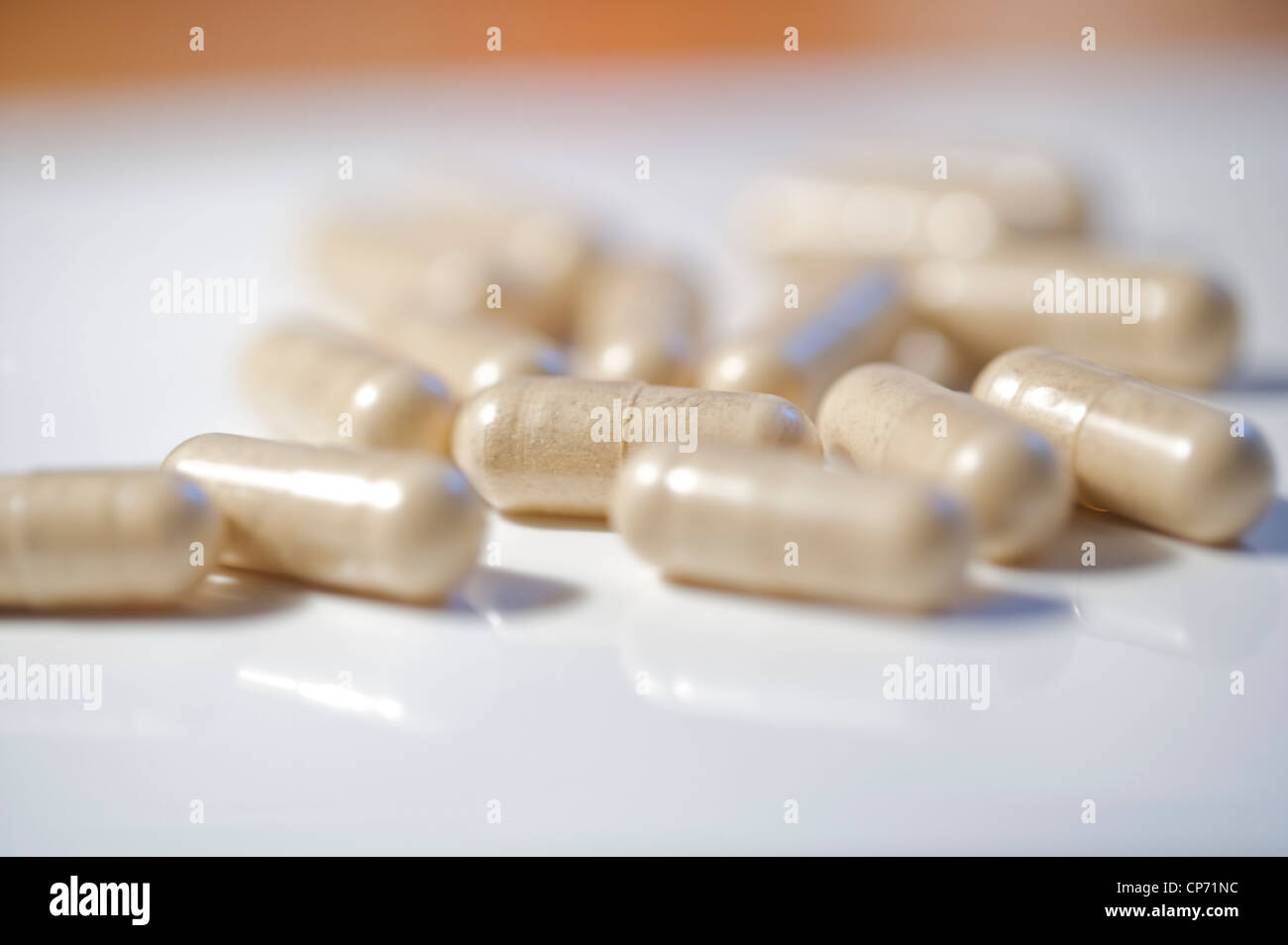 Food supplements, closeup of capsules Stock Photo - Alamy