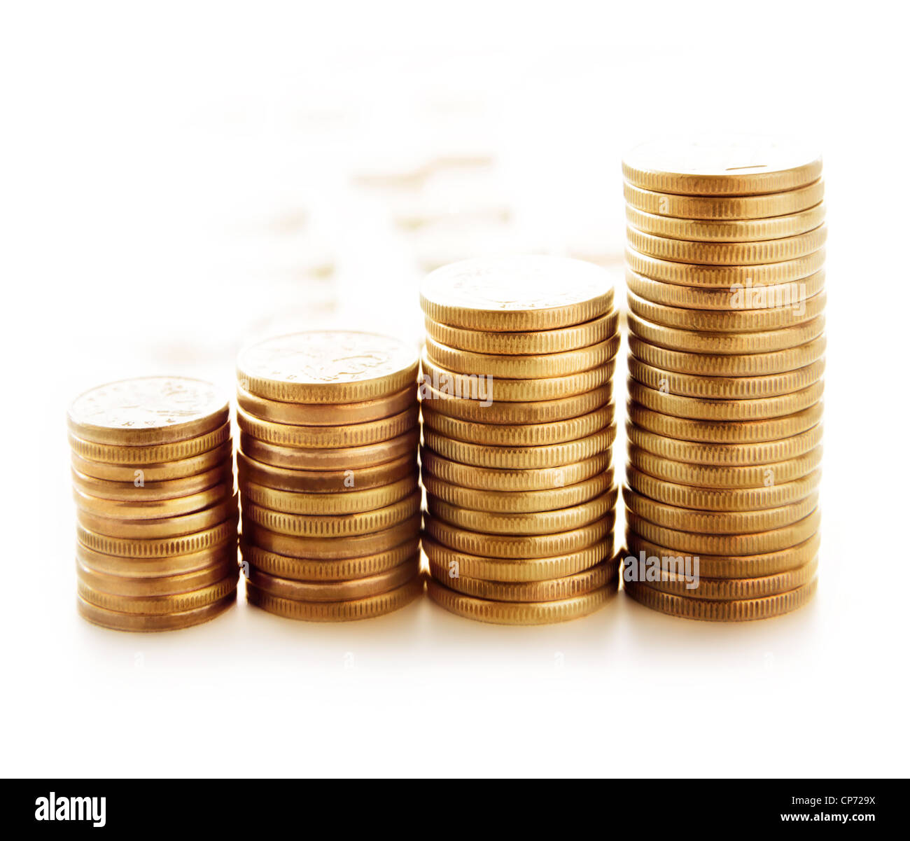 Golden Coins In Ascending Order On A White Background Stock Photo - Alamy