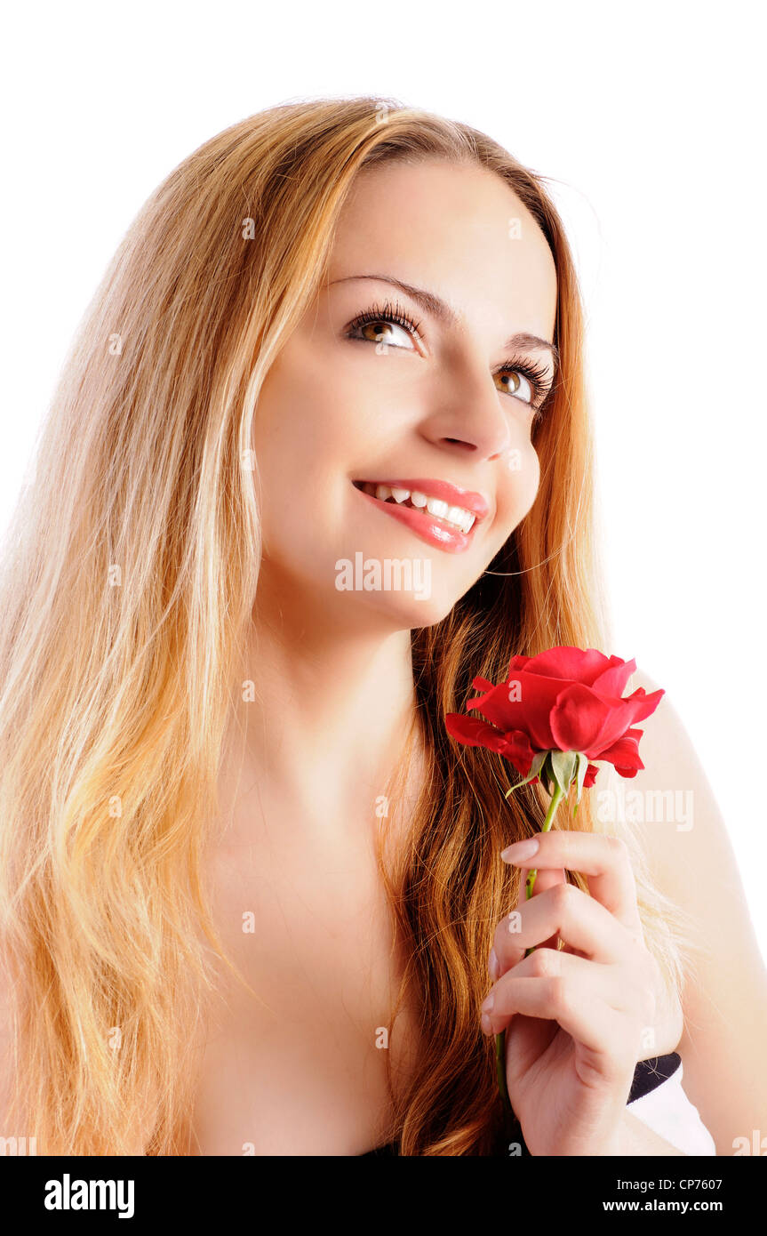 Beautiful girl holding a rose Stock Photo - Alamy
