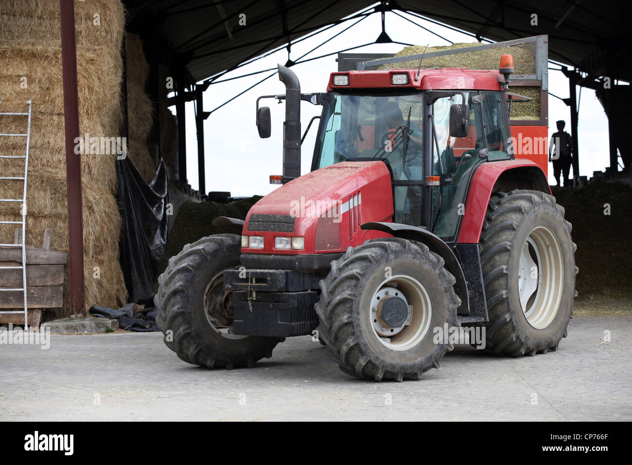 Tractor in a farm Stock Photo - Alamy