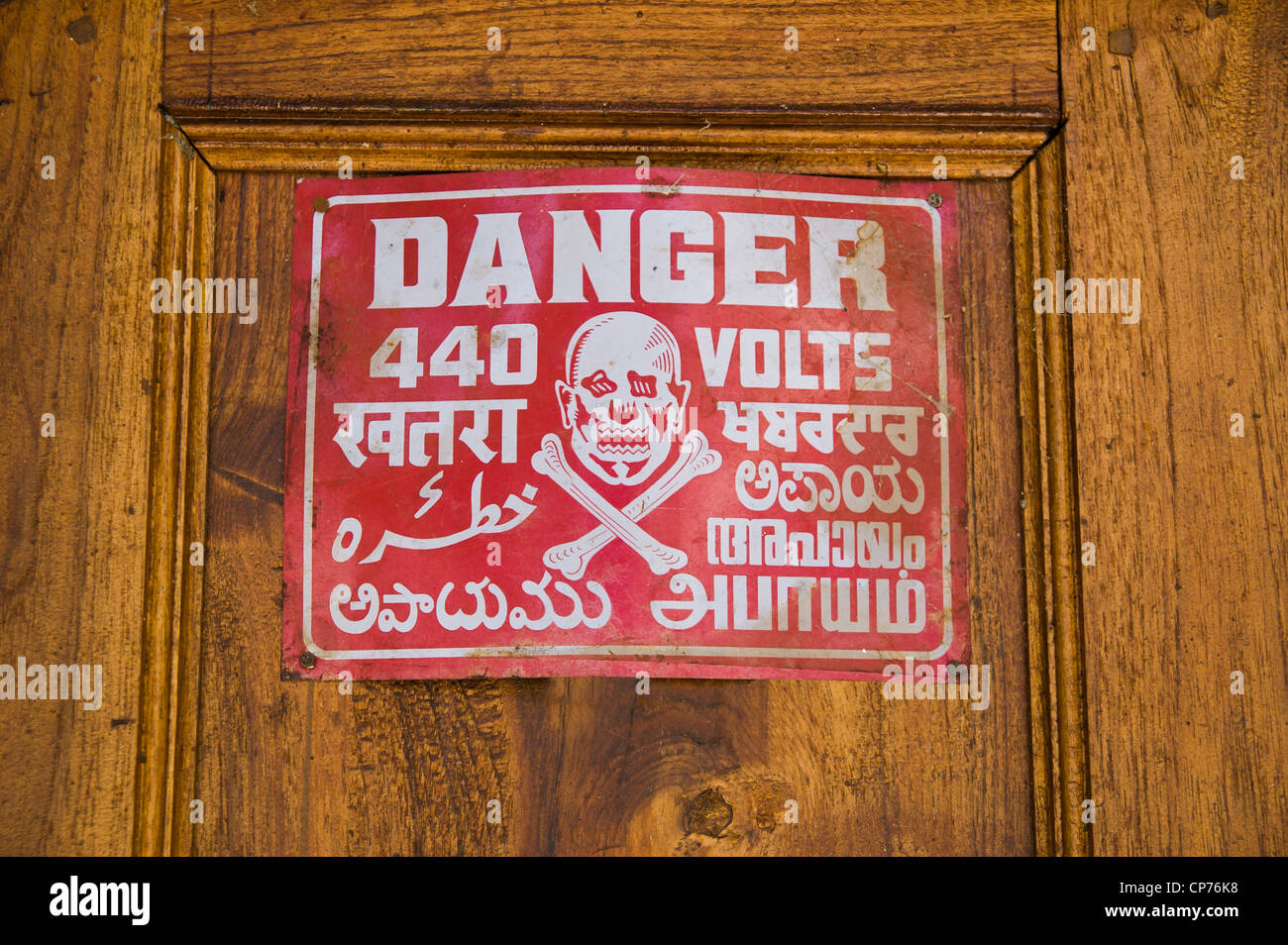 Warning sign on a door in Udaipur, India Stock Photo - Alamy
