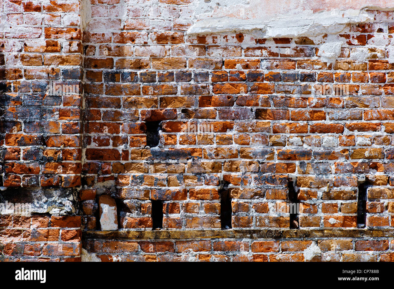 Interior walls and structure of the historic Unique Theater are exposed ...