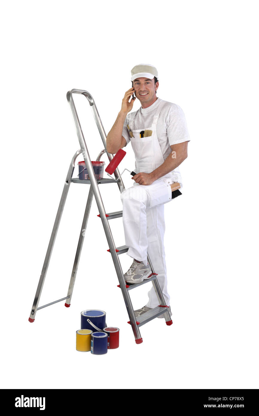 Male decorator with step ladder Stock Photo - Alamy