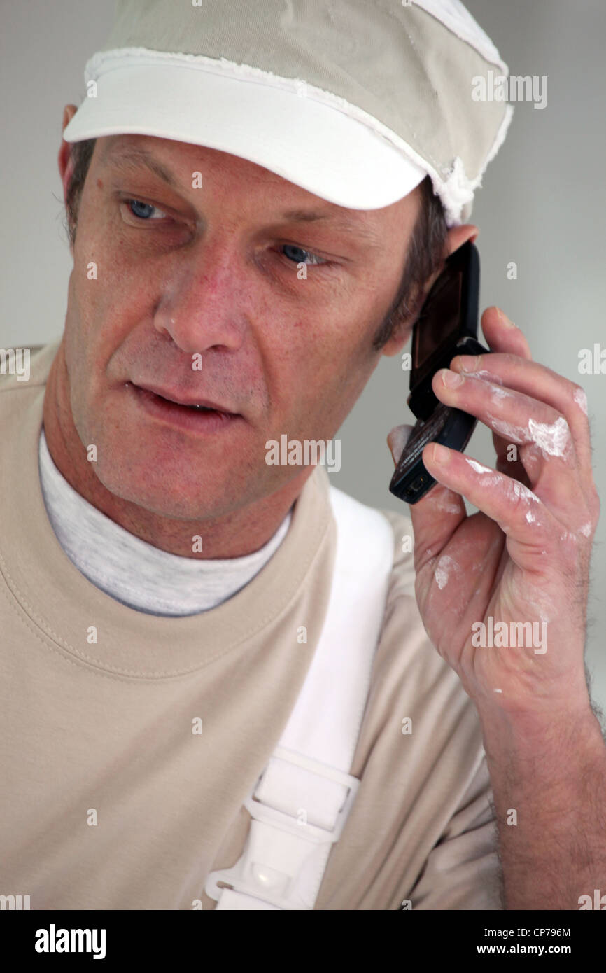 painter making a call Stock Photo - Alamy