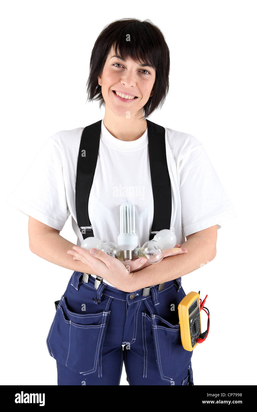 Female electrician holding light bulbs Stock Photo - Alamy