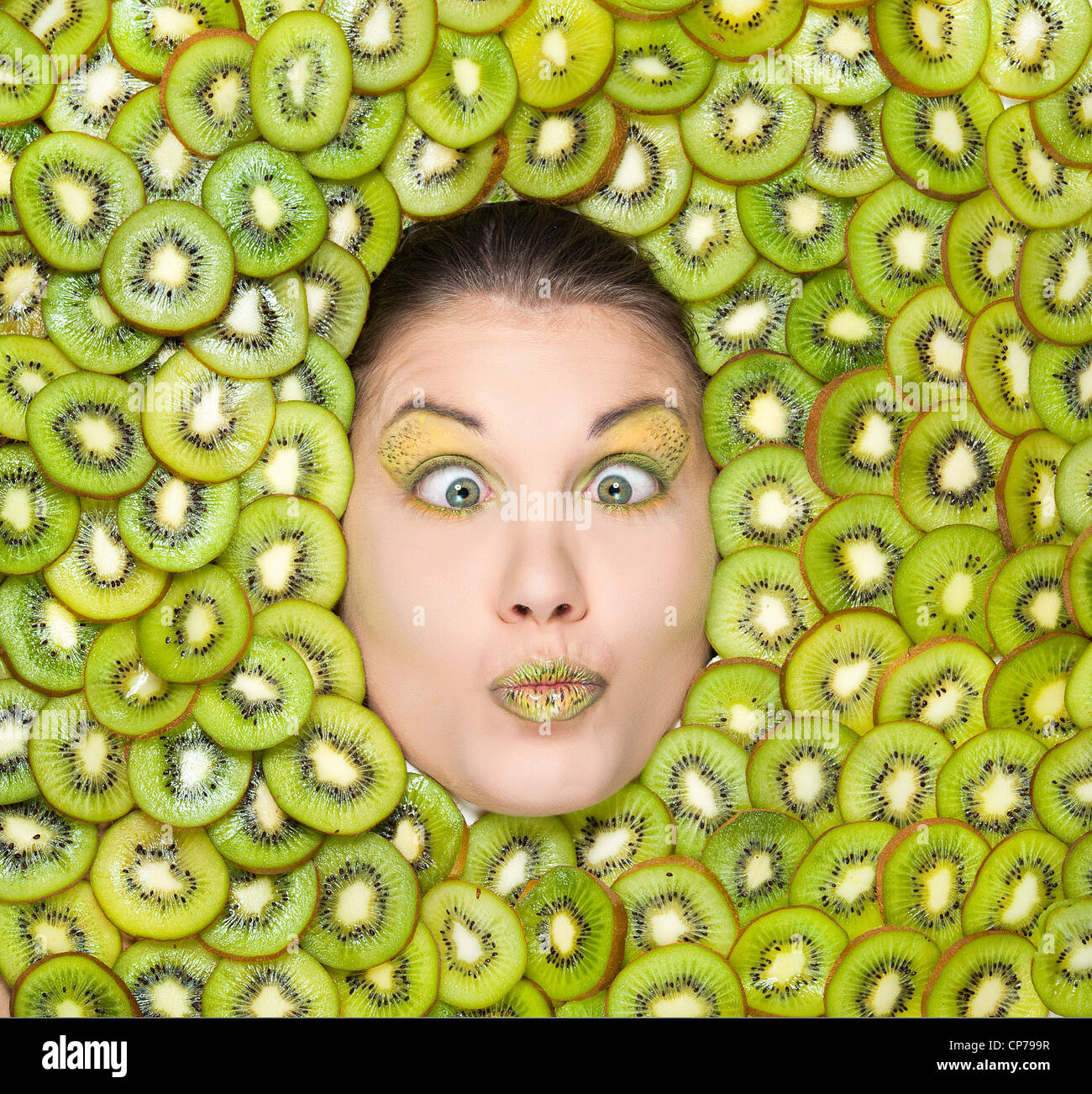 a creative makeup with kiwi fruit Stock Photo - Alamy