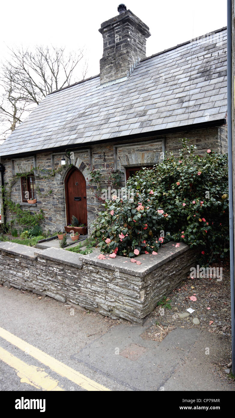 A small stone Welsh cottage with a walled garden Stock Photo - Alamy