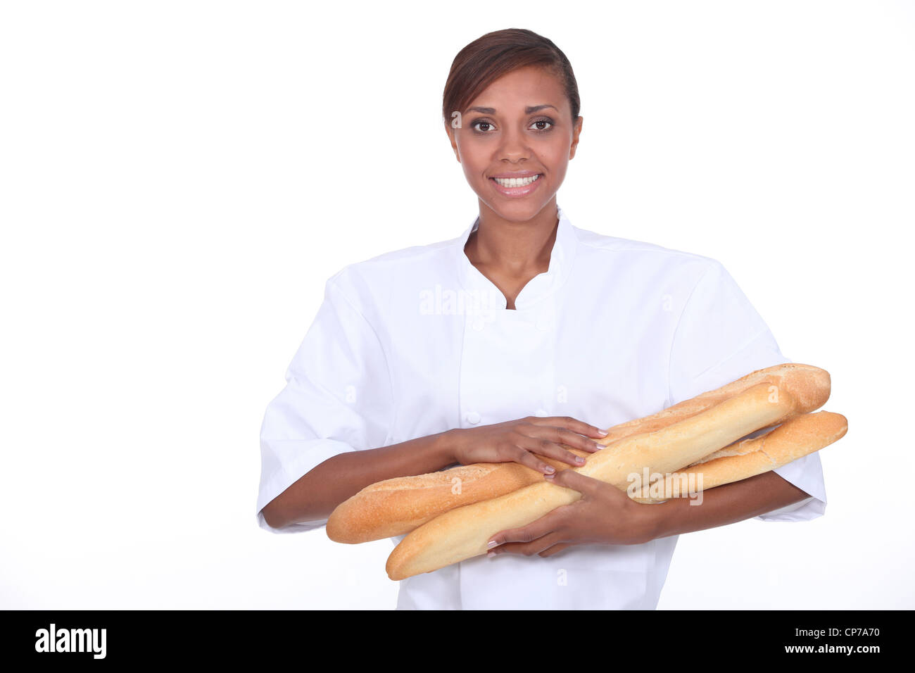 Woman with loaves of bread in the arms Stock Photo - Alamy