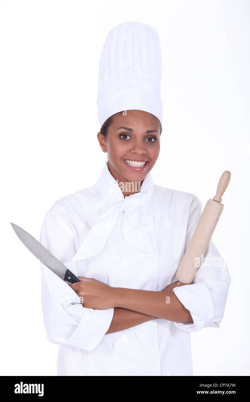 Chef with a rolling pin and knife Stock Photo - Alamy