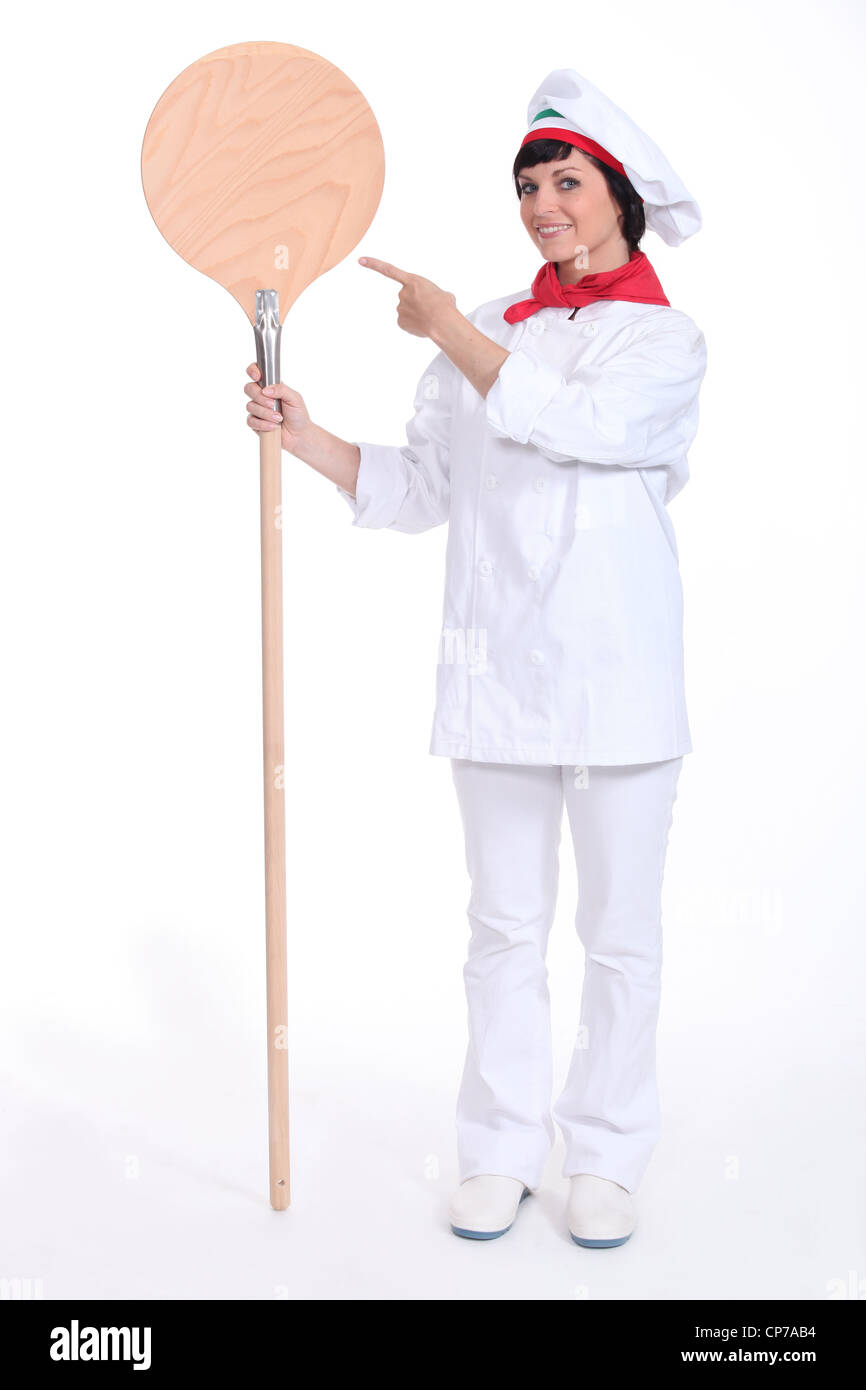 Female pizza chef with a wooden peel Stock Photo - Alamy
