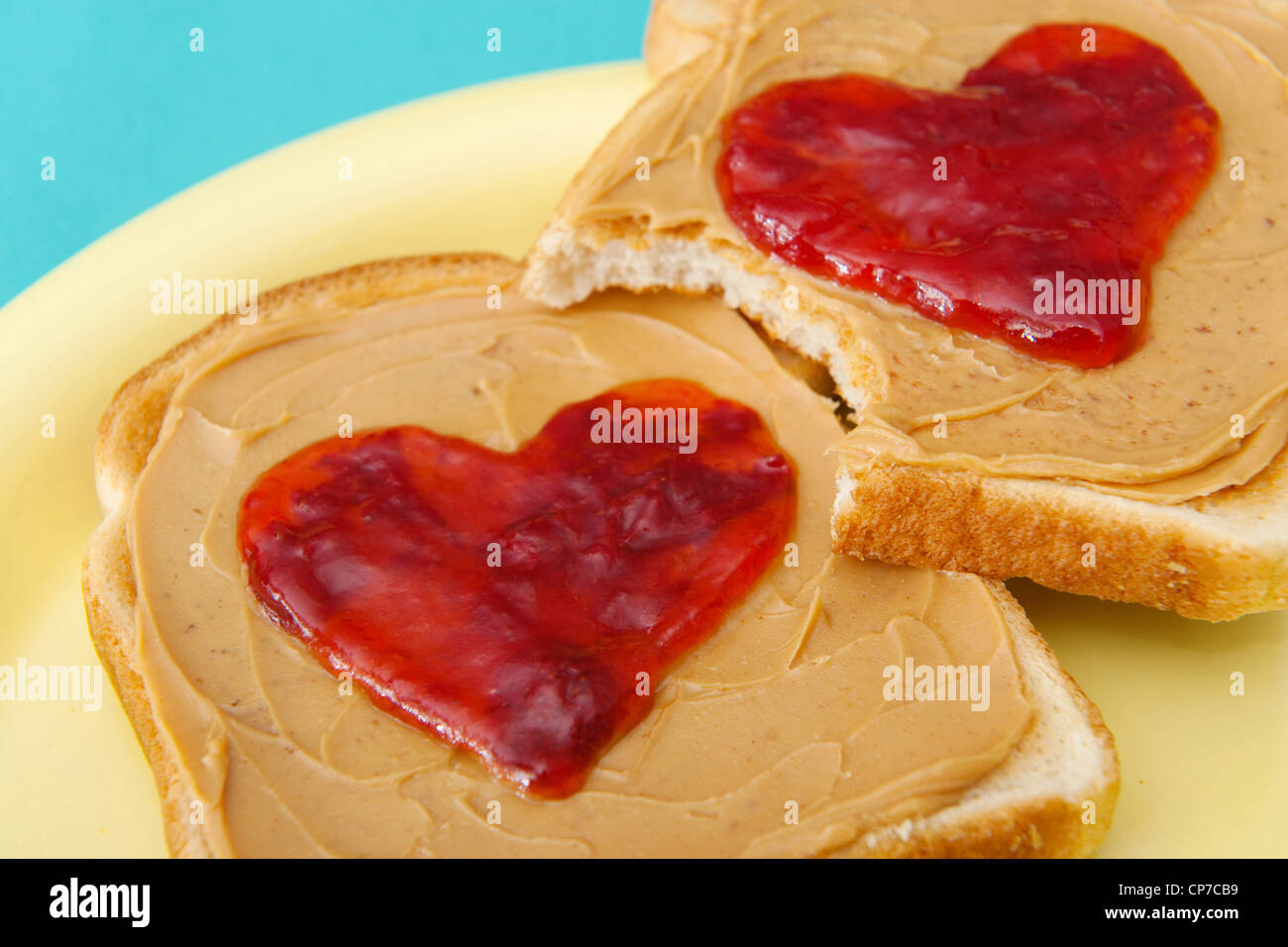 Peanut butter and jelly on toast served for valentines day Stock Photo ...