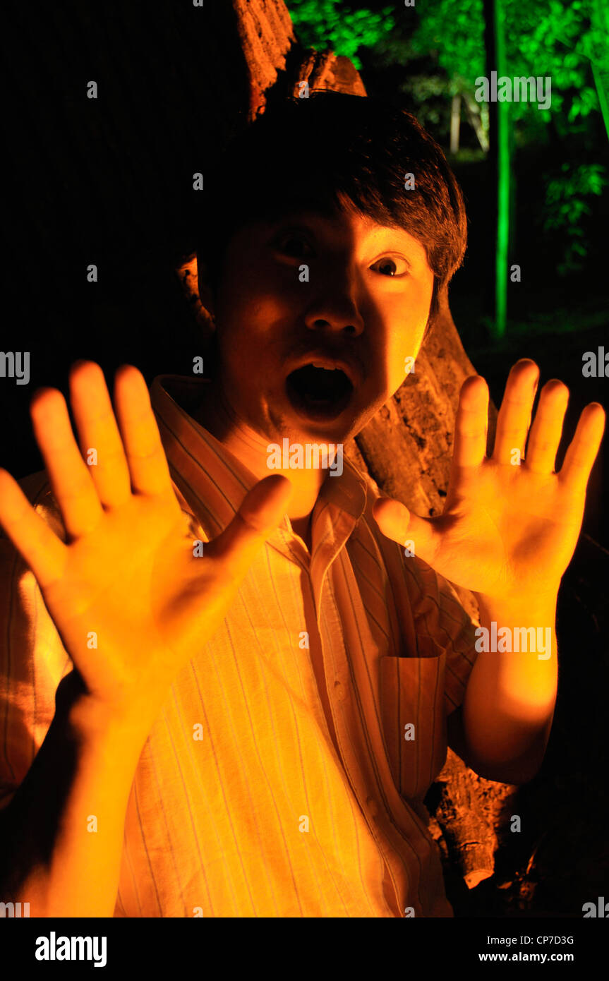 scared man in forest Stock Photo - Alamy