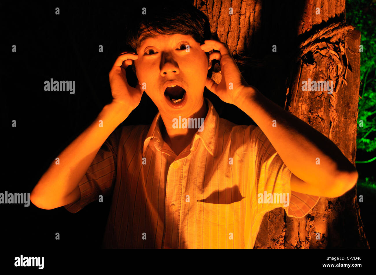 terrified man in forest Stock Photo - Alamy