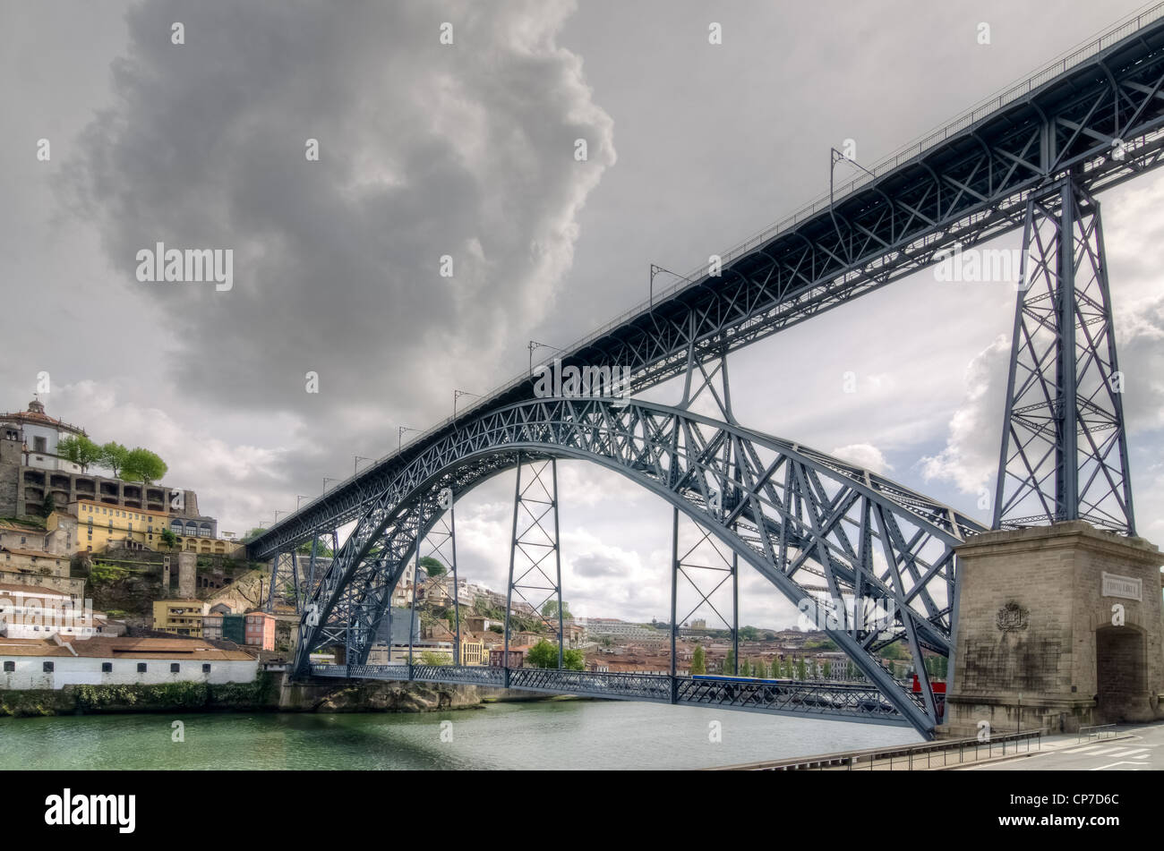 Famous steel bridge Ponte dom Luis above connects Old town Porto with ...