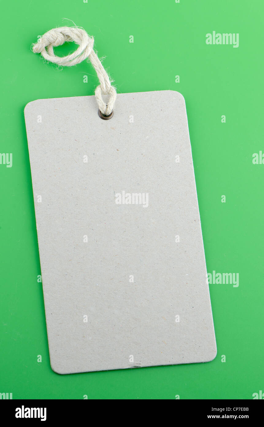 Blank product info label on green background Stock Photo - Alamy