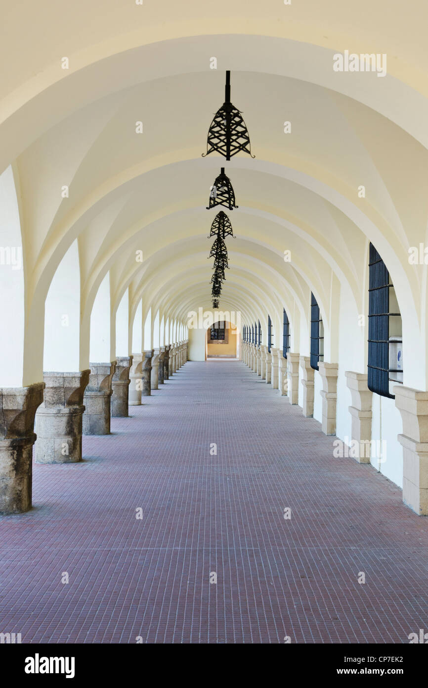Arched colonnade under the Italian era Provincial Government building ...