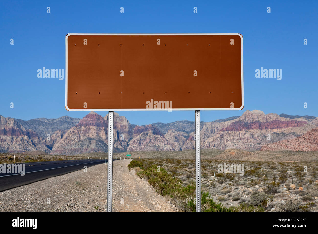 Blank brown highway sign with Nevada desert highway background Stock ...
