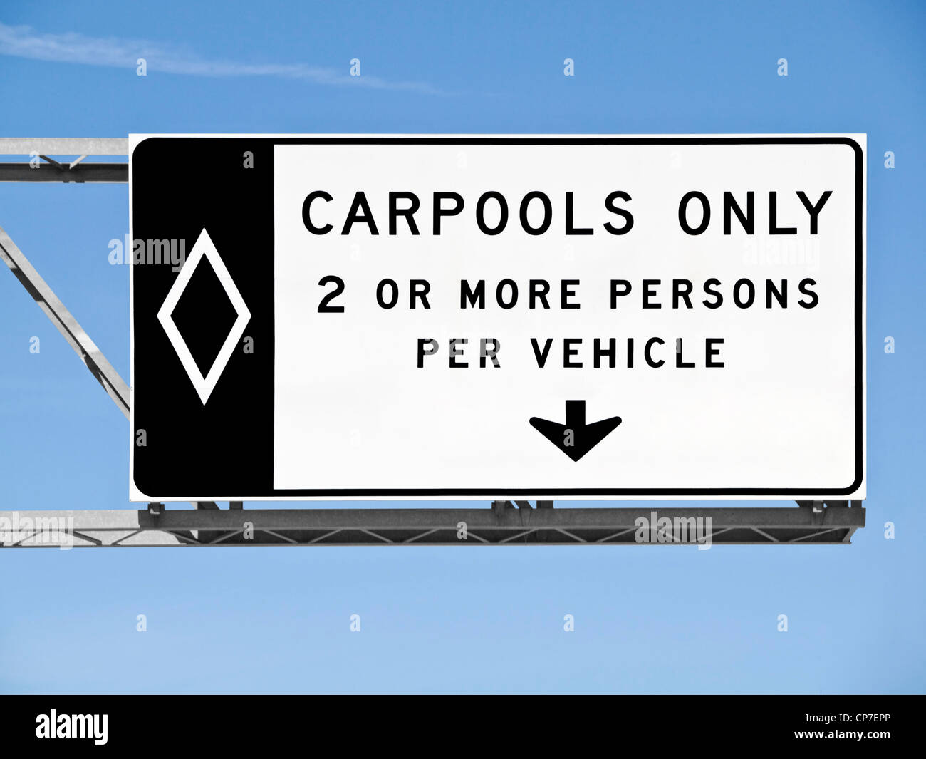 Overhead freeway carpool only sign isolated on white Stock Photo - Alamy