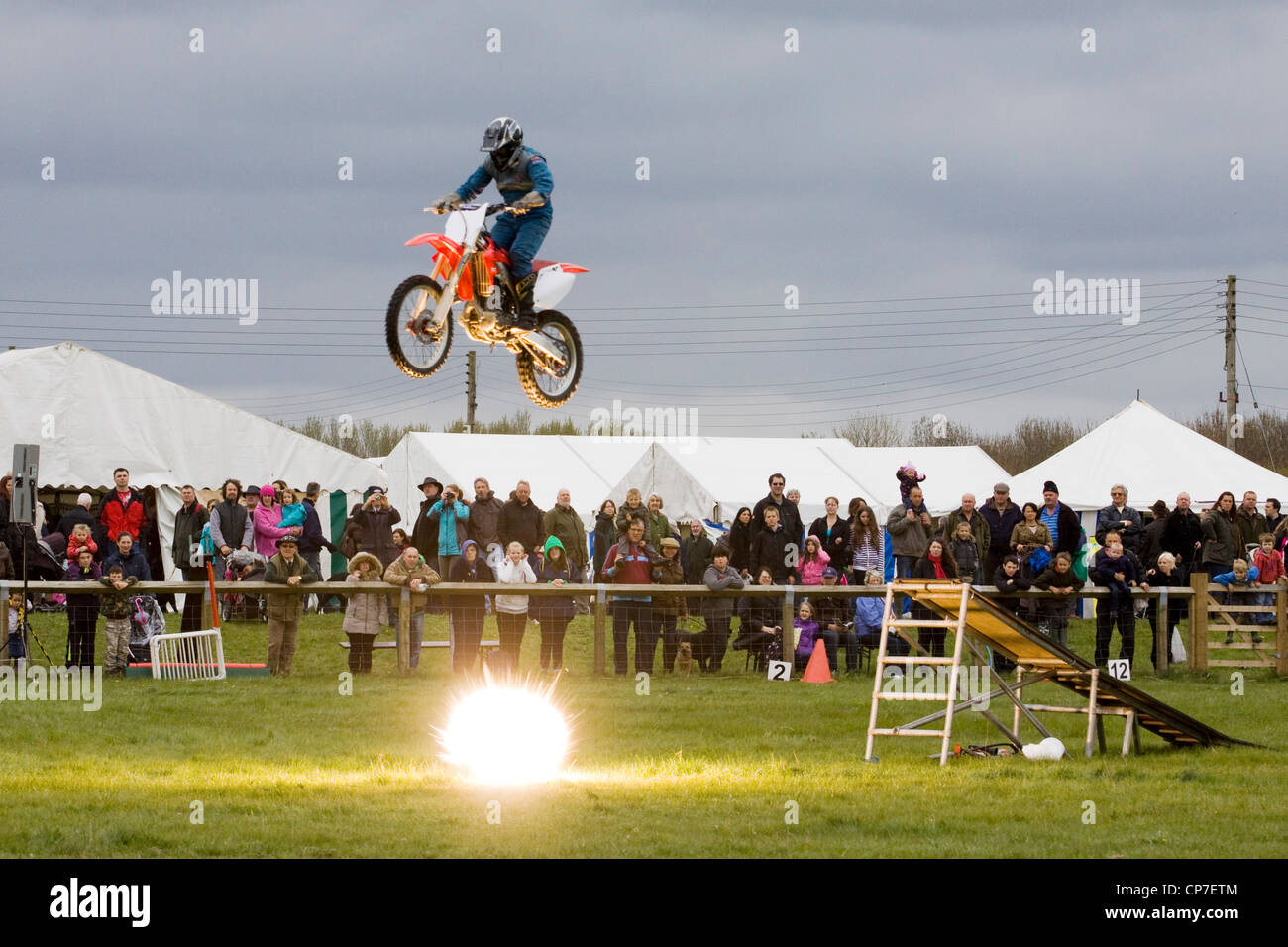 A Motorcycle fire stunt team display at a county Fair in england UK ...