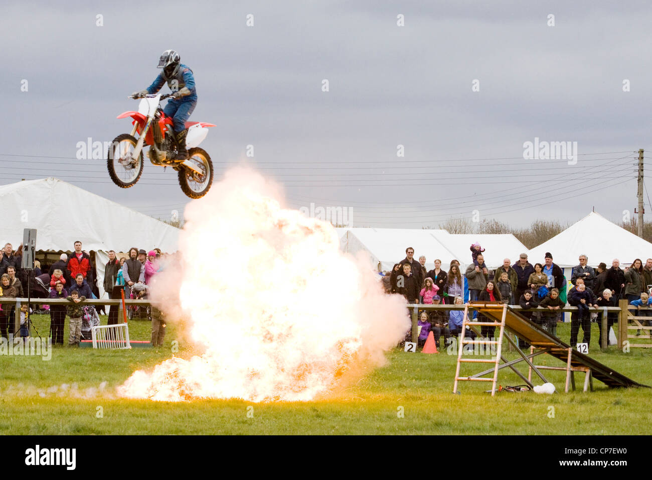 A Motorcycle fire stunt team display at a county Fair in england UK ...