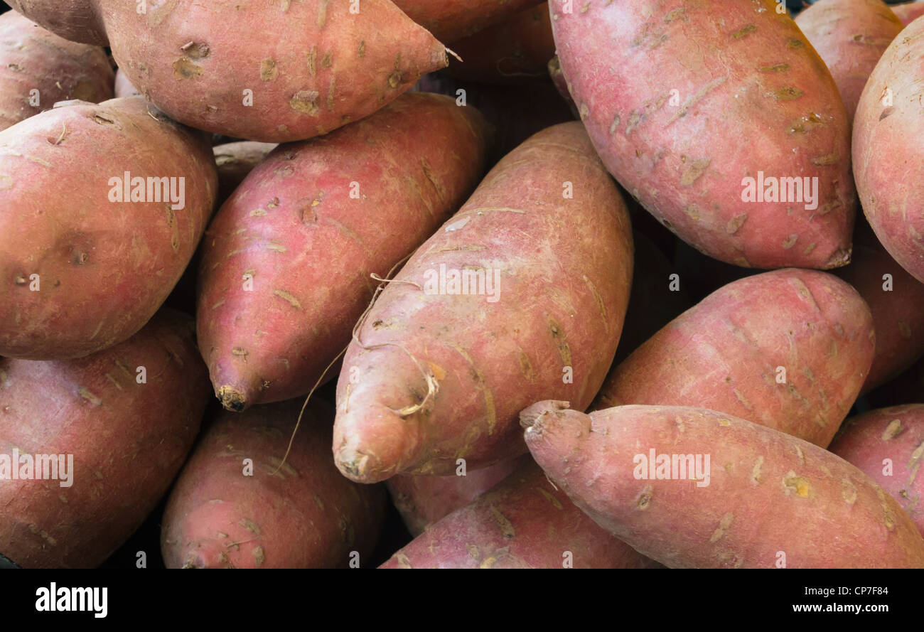Whole sliced raw sweet potato hi-res stock photography and images - Alamy