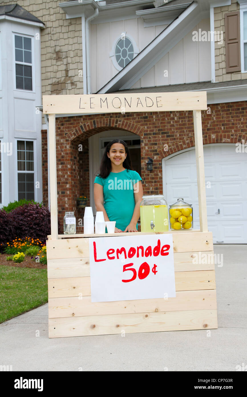 Child selling lemonade in front of her home Stock Photo - Alamy