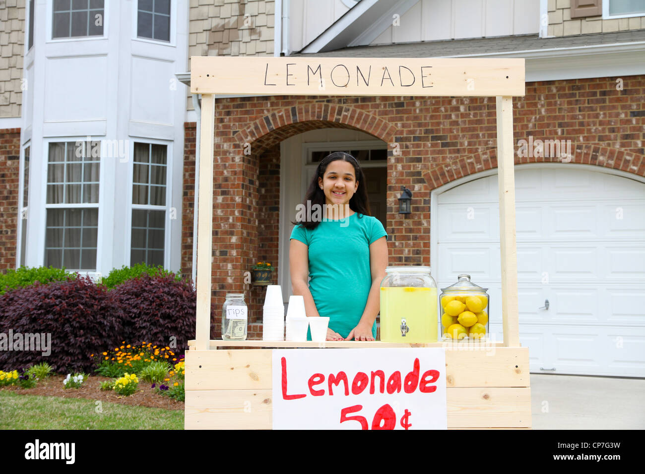 Child selling lemonade in front of her home Stock Photo - Alamy