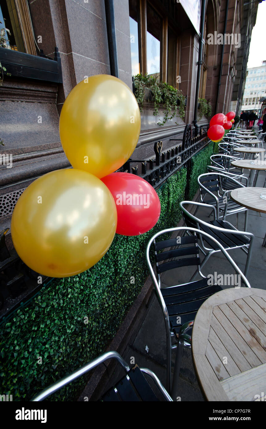 Balloons tied outside a pub in St Andrews Square in the centre of ...