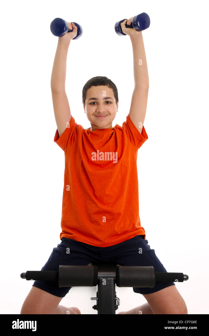 Teenage Boy Working Out with Hand Weights Stock Photo - Alamy